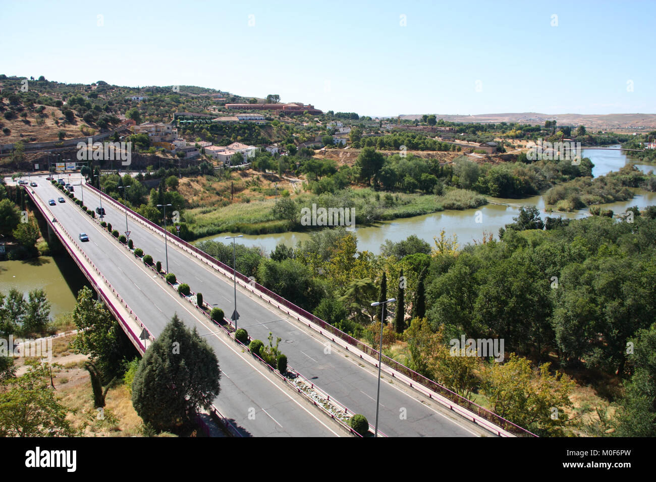 Tagus river bridge in the suburbs of Toledo, Spain. Spanish landscape ...