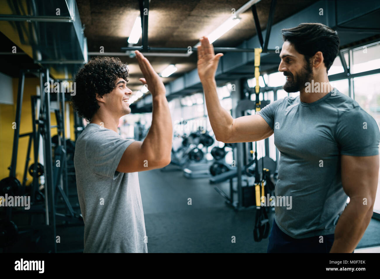 Man doing workout with a personal trainer Stock Photo - Alamy