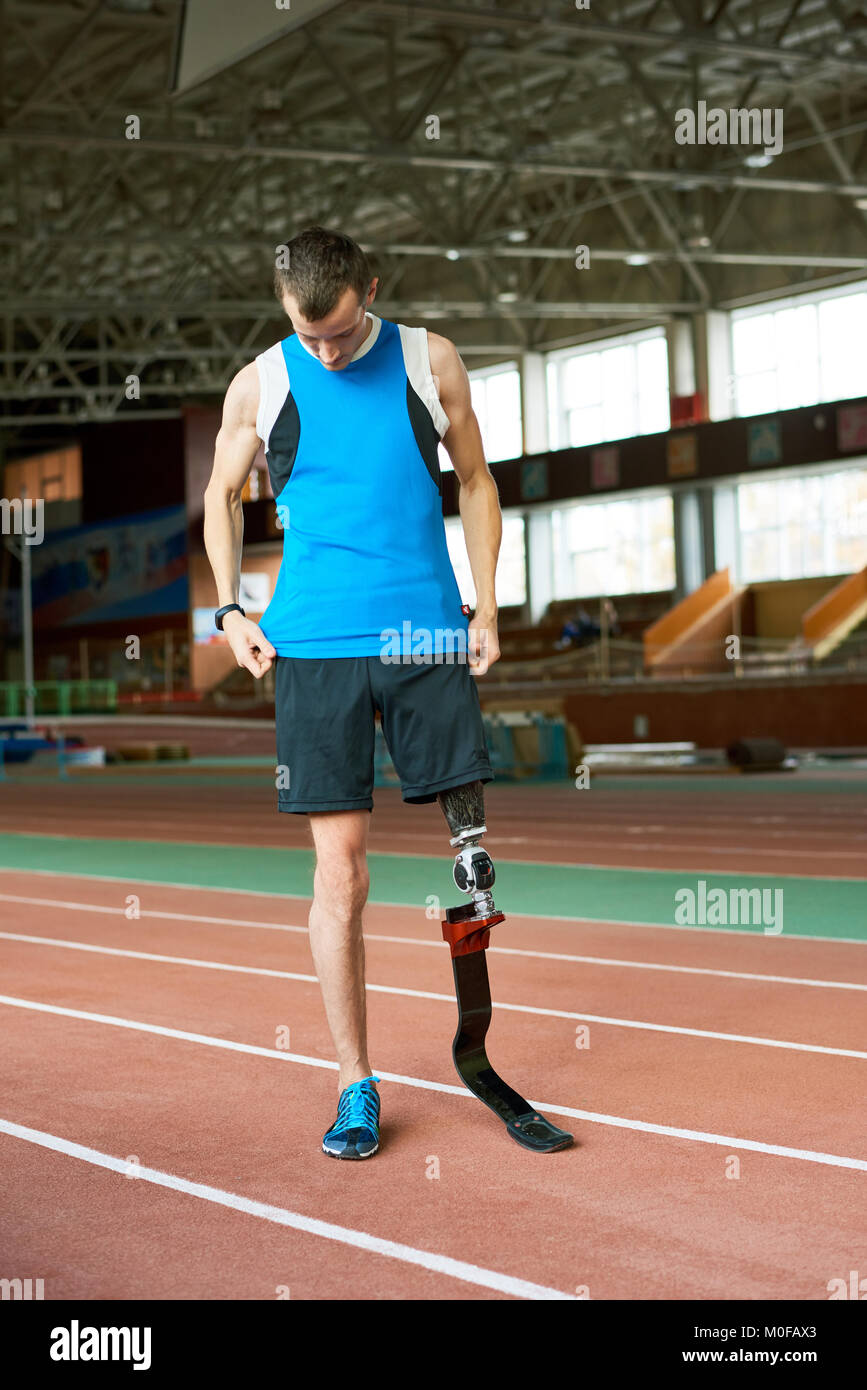 Handicapped Runner on Track in Stadium Stock Photo - Alamy