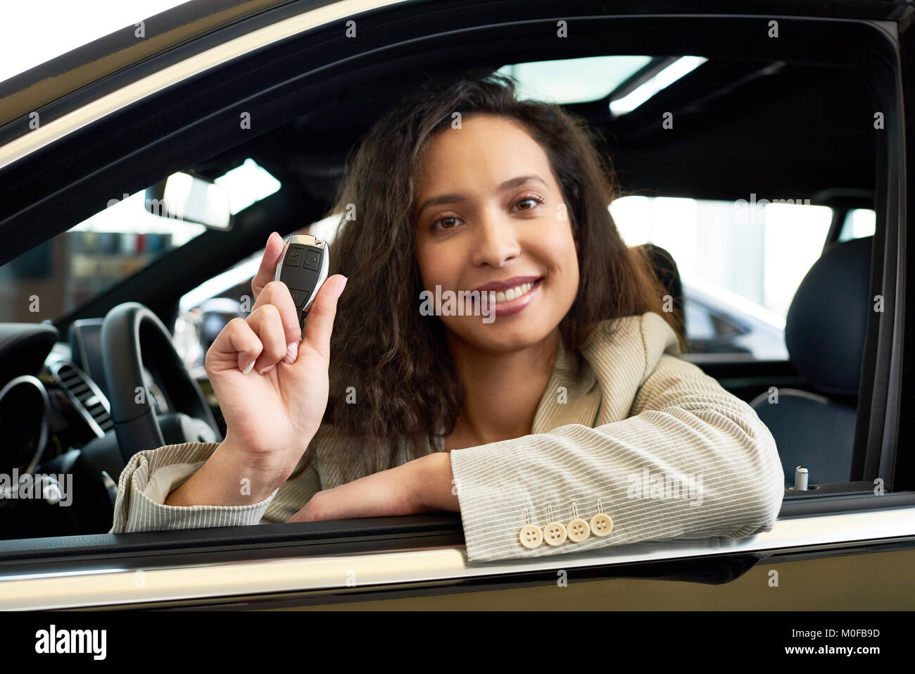Pretty Driver of New Car Stock Photo - Alamy
