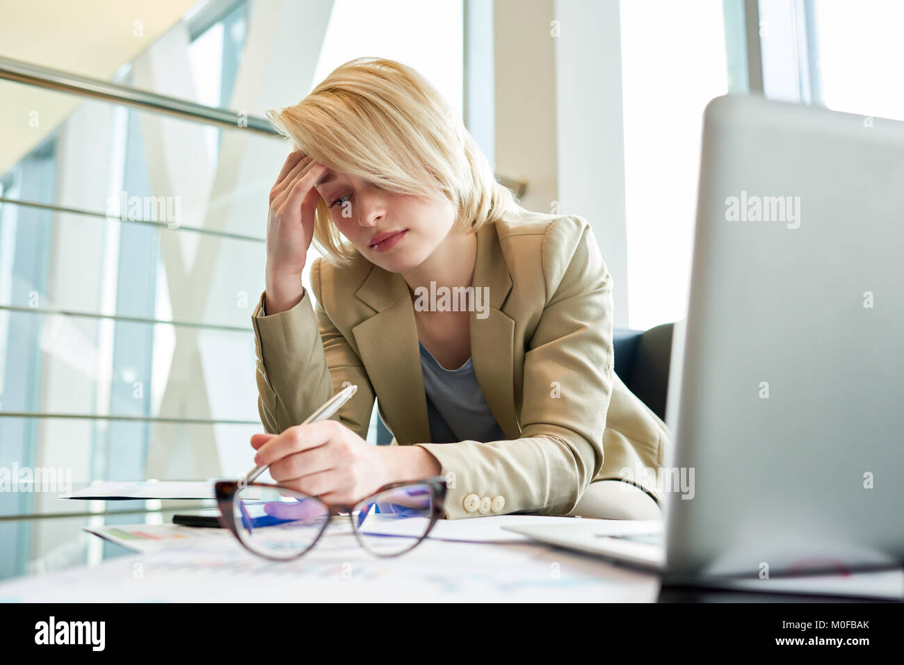 Woman analyzing data sitting hi-res stock photography and images - Alamy