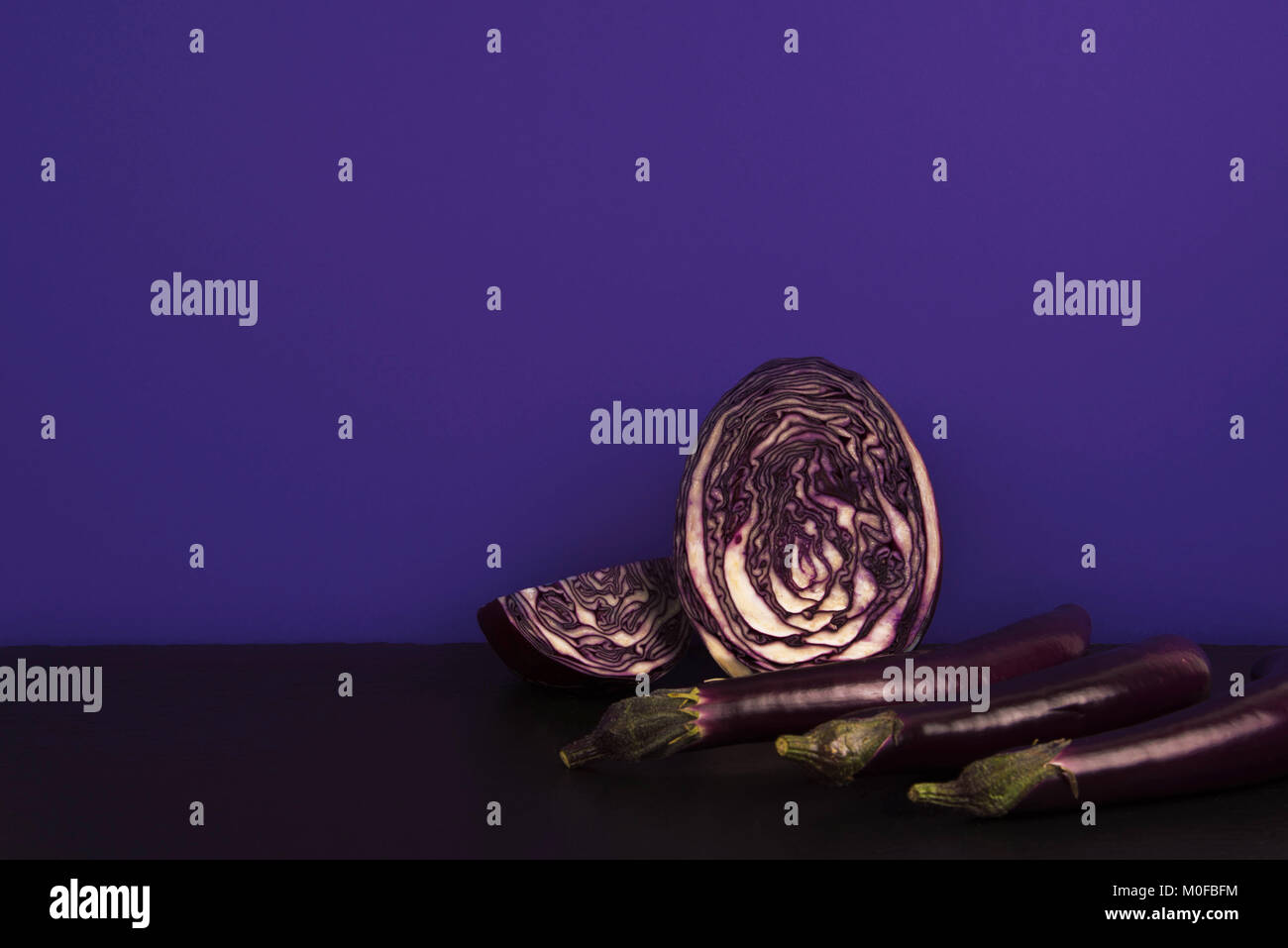 Assortment of raw organic violet vegetables Stock Photo - Alamy