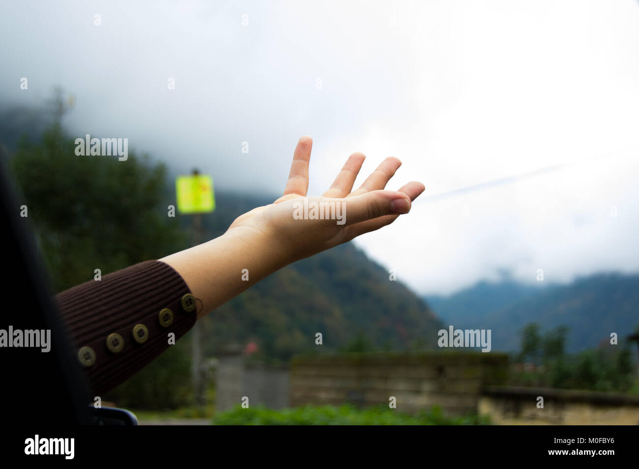 wind through the fingers Stock Photo - Alamy