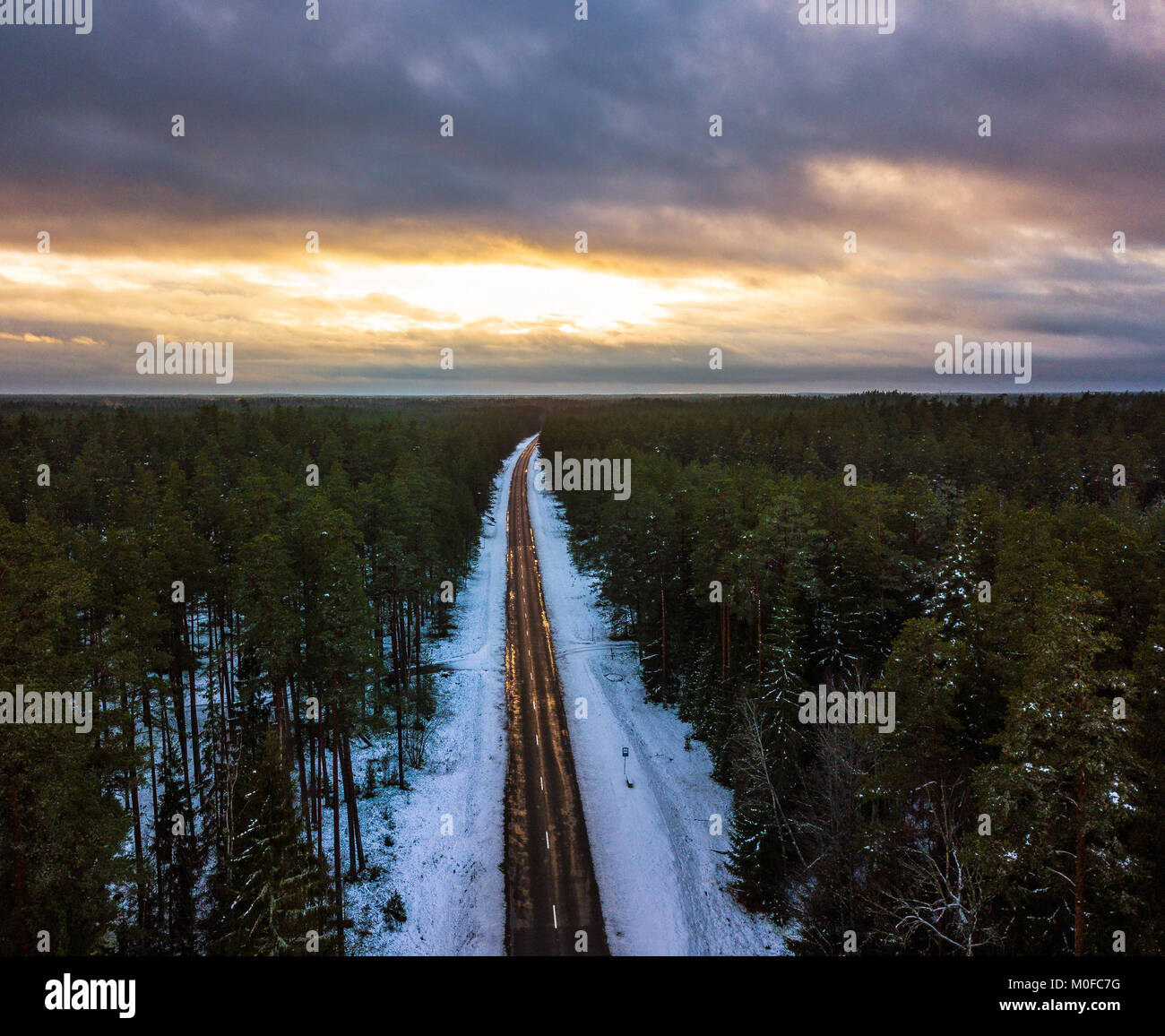 Beautiful shot snowy road hi-res stock photography and images - Alamy