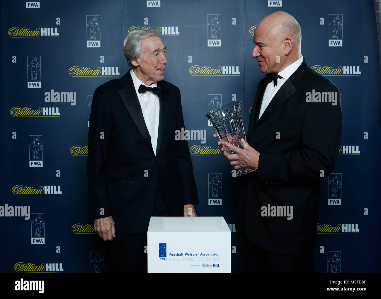 Chairman of the FWA Patrick Barclay prepares to hand the trophy to ...