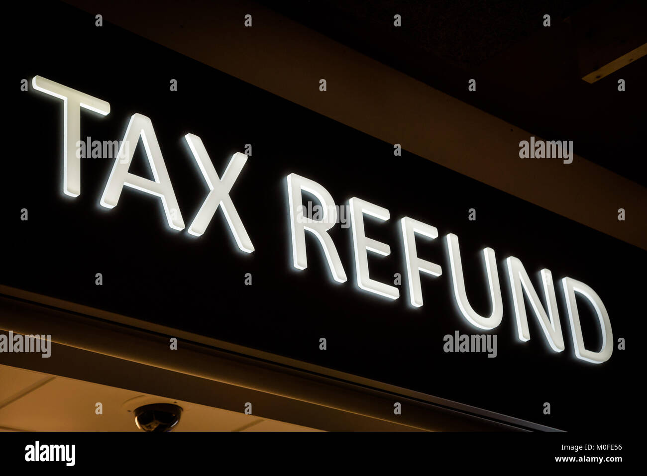 Tax Refund sign inside airport terminal Stock Photo - Alamy