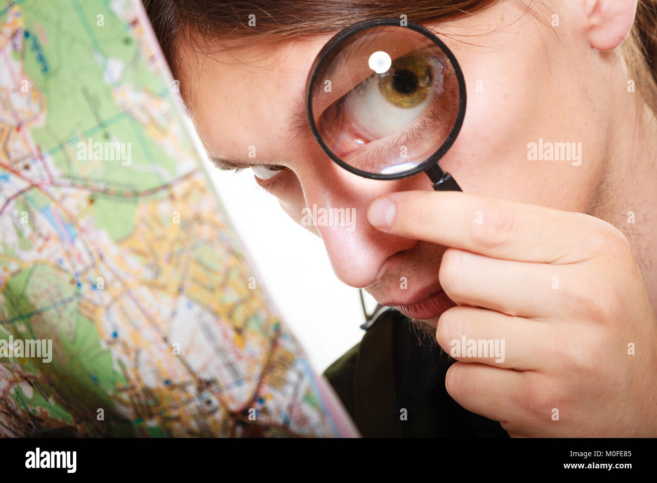 Detective looking clues magnifying glass hi-res stock photography and ...