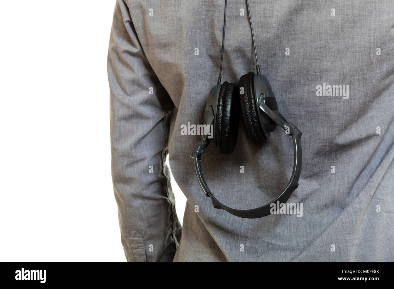 Music devices, digital sound concept. Closeup of headphones hanging ...