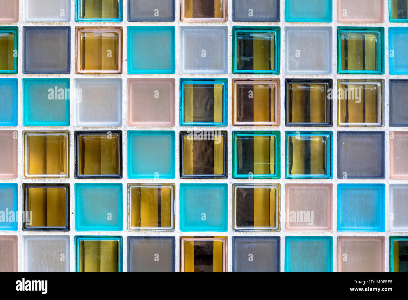 Wall of transparant glass boxes serving as colorful window wallpaper ...