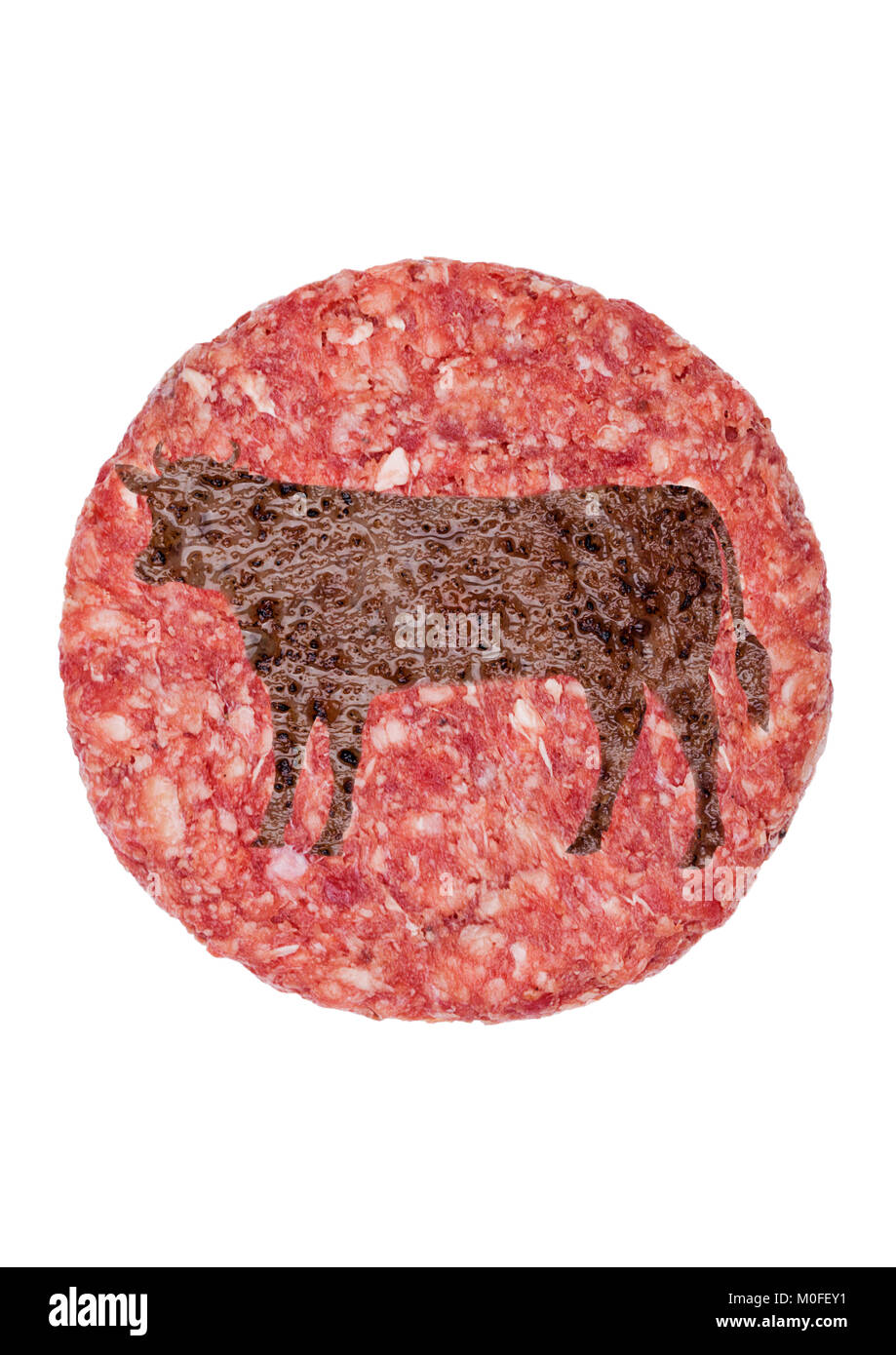 Raw fresh large beef burger with cow shape on white background Stock ...
