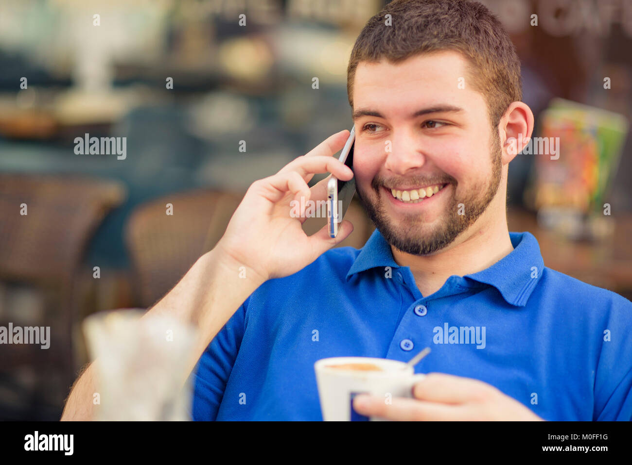 Man speaking at restaurant hi-res stock photography and images - Alamy