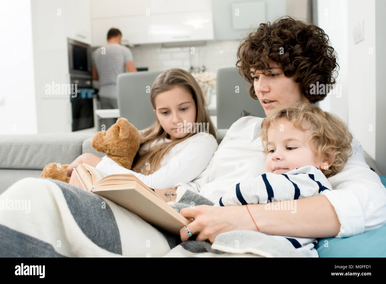 Loving Family Enjoying Weekend Together Stock Photo - Alamy
