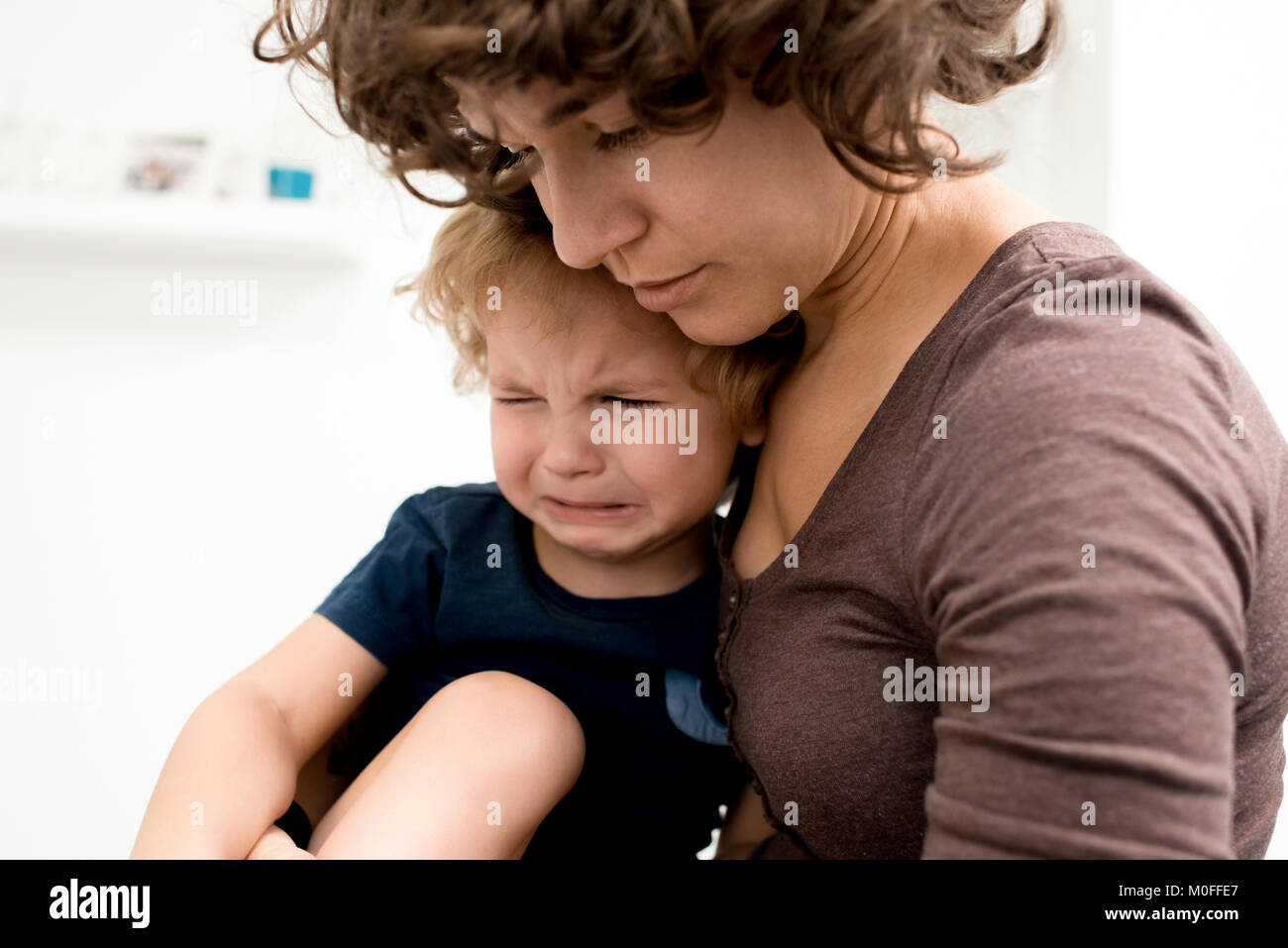 Calming Down Little Boy Stock Photo - Alamy