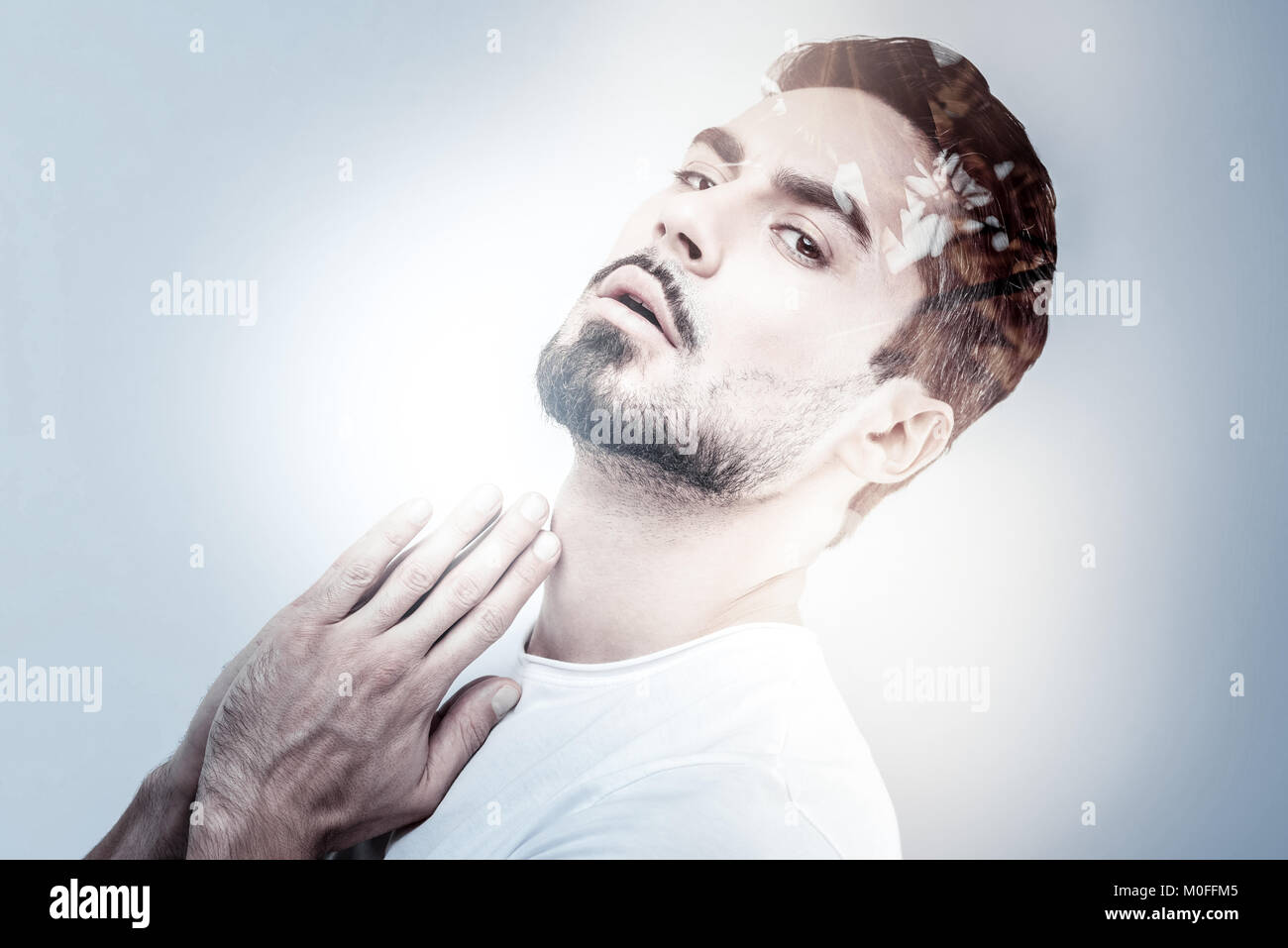 Self-confident brunette holding hands together Stock Photo - Alamy