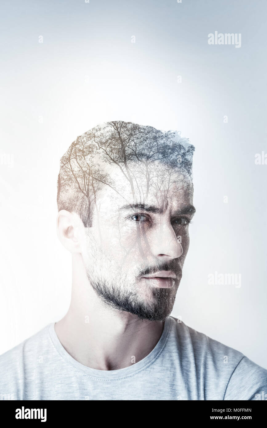 Handsome male model posing on camera Stock Photo - Alamy