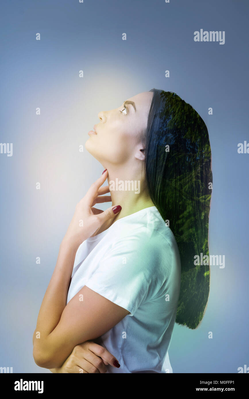 Attentive girl being deep in thoughts Stock Photo - Alamy