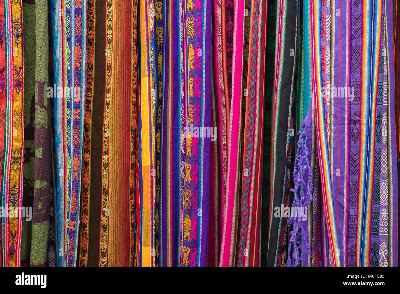 Otavalo, Ecuador - January 13, 2018: colourful indigenous textiles in ...