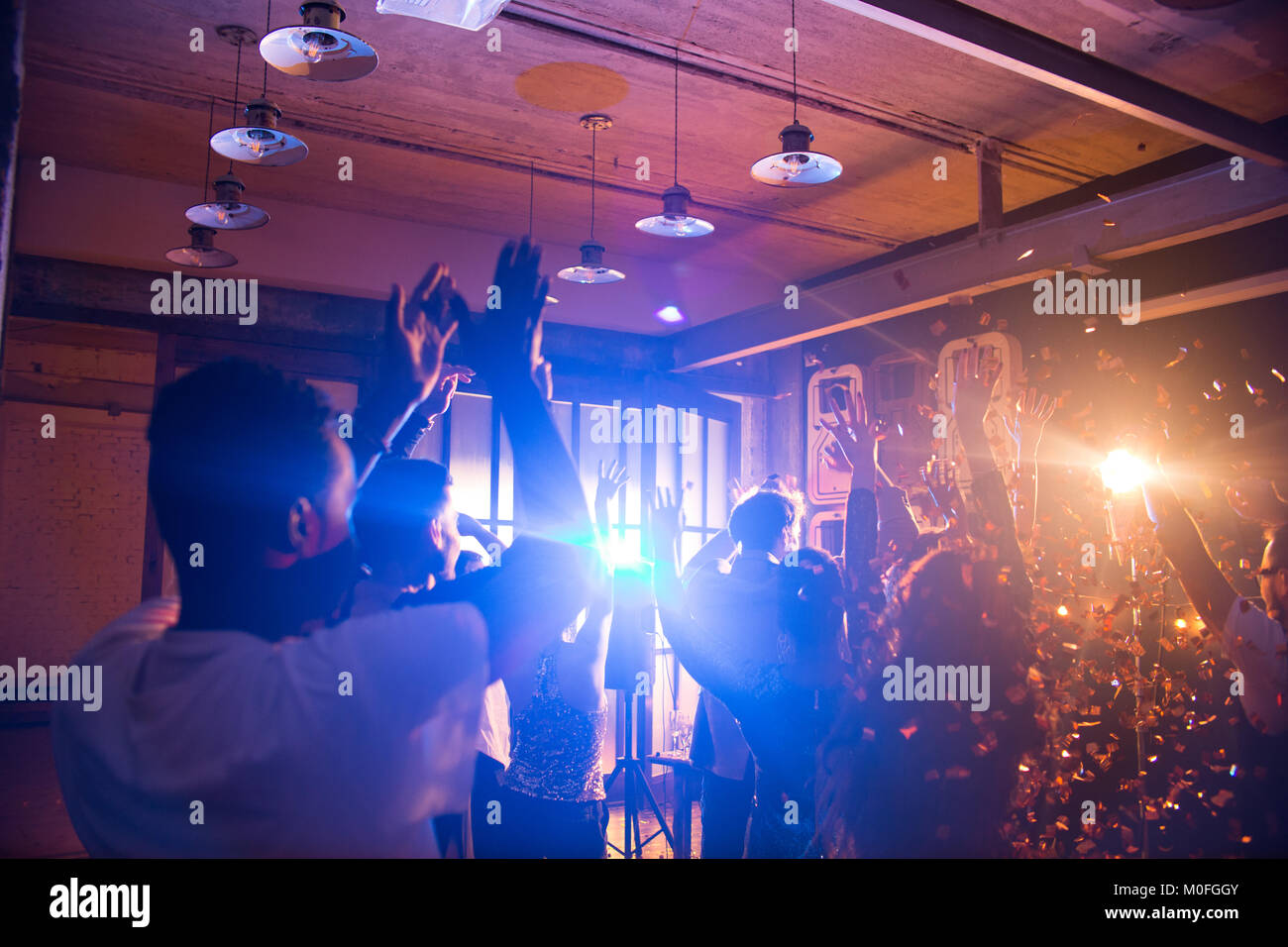 Young People Jumping to Music Stock Photo - Alamy