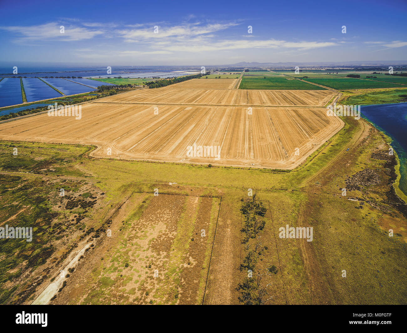 Aerial landscape of plowed field and mountains on the horizon Stock ...