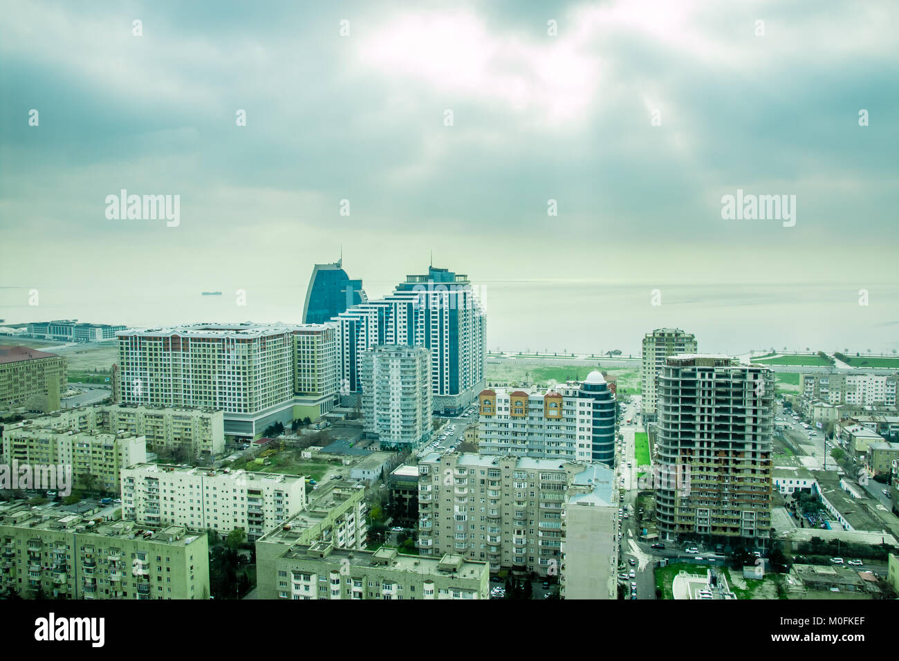 City view skyscrapers with dramatic cloudy sky background Stock Photo ...