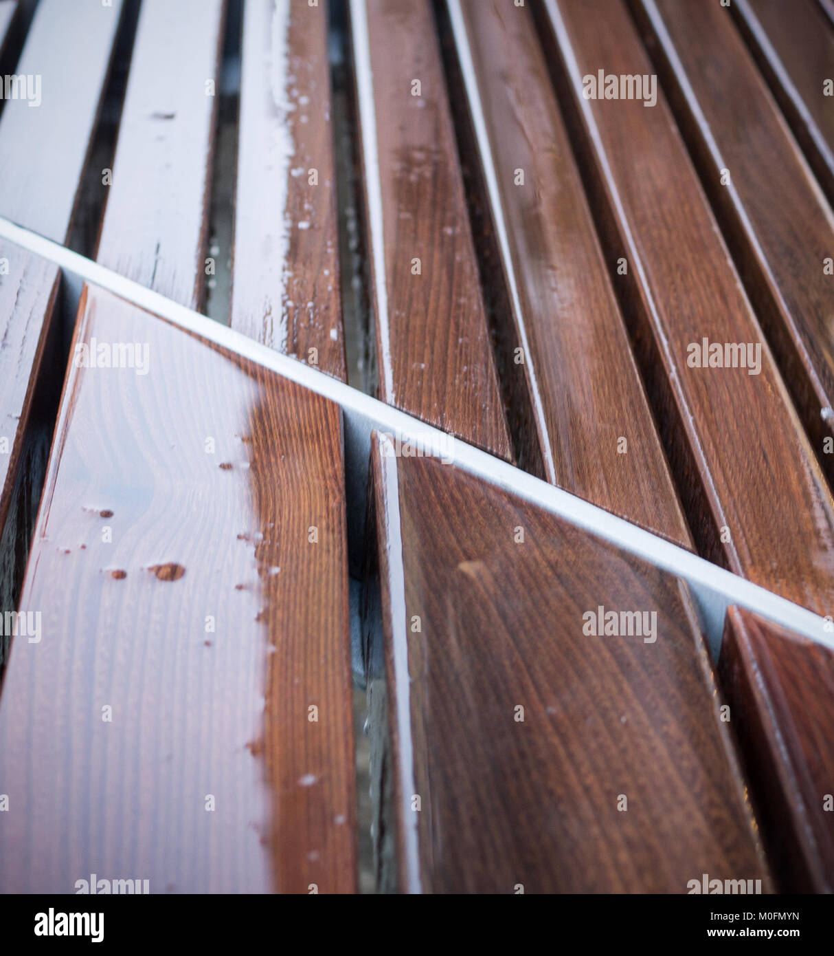 wet wooden bench texture. vignette, background Stock Photo - Alamy