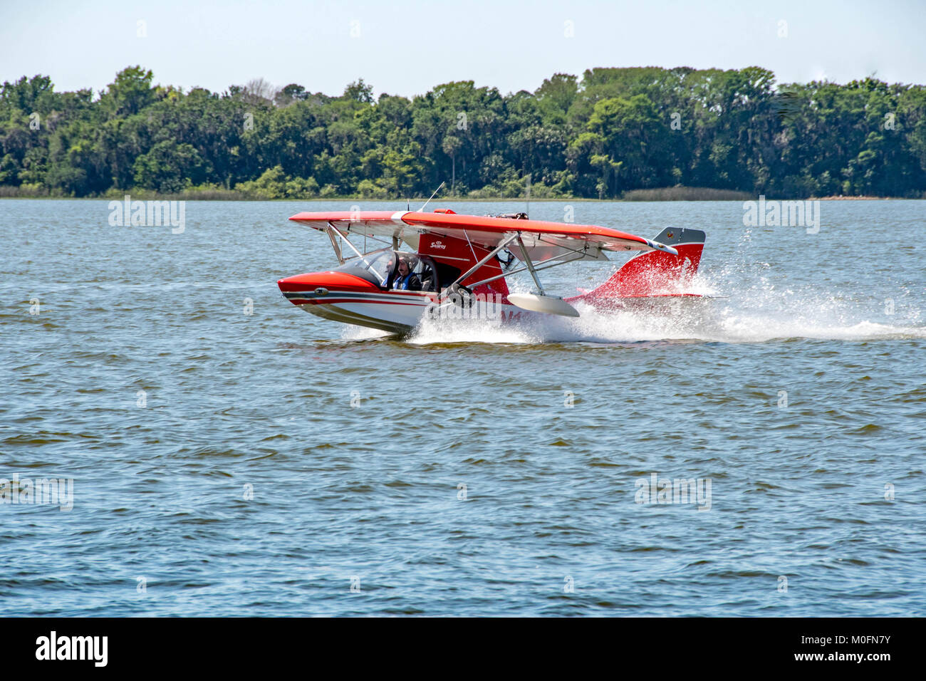 A Searey sport seaplane splashes down into the water Stock Photo - Alamy