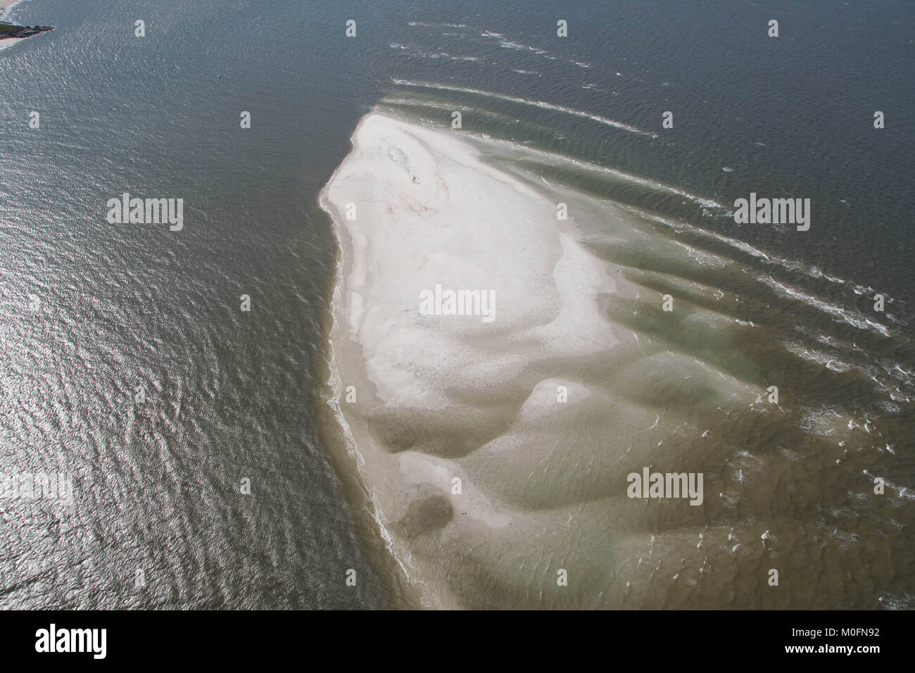 Sand bar radiates off into the sea on Georgia coast Stock Photo - Alamy