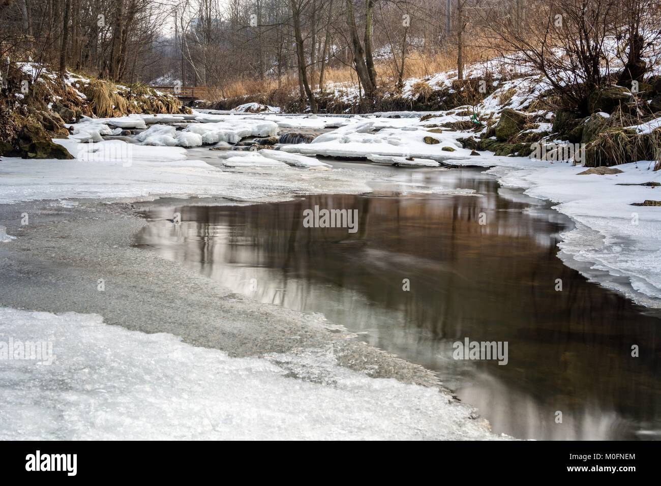 Small Creek In Winter Ice And Snow Stock Photo - Alamy