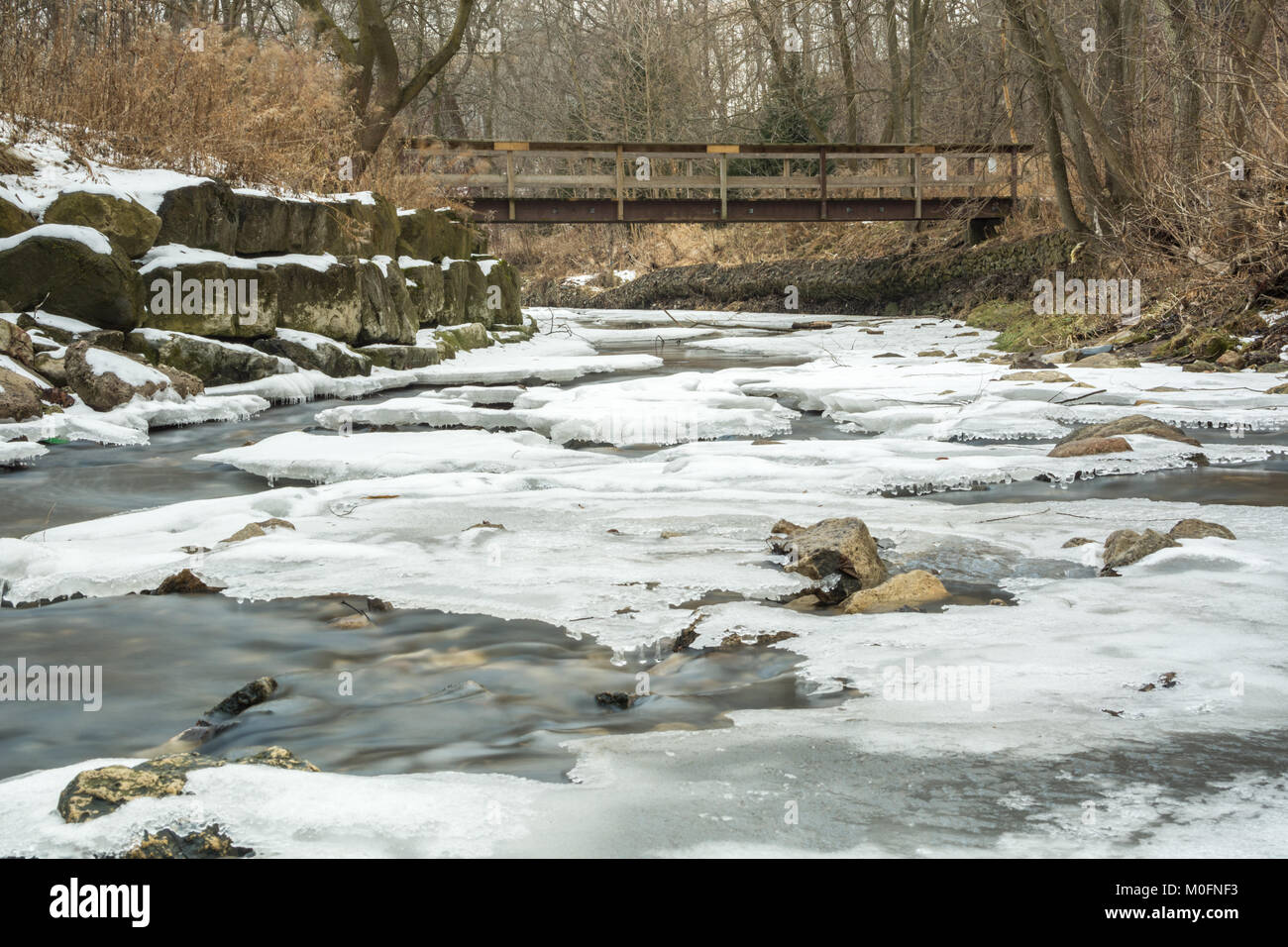 Small Creek In Winter Ice And Snow Stock Photo - Alamy