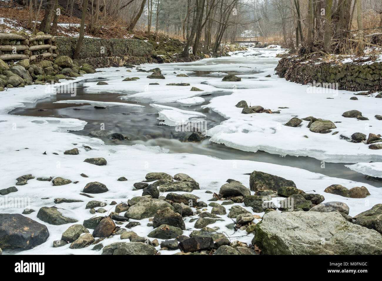 Small Creek In Winter Ice And Snow Stock Photo - Alamy