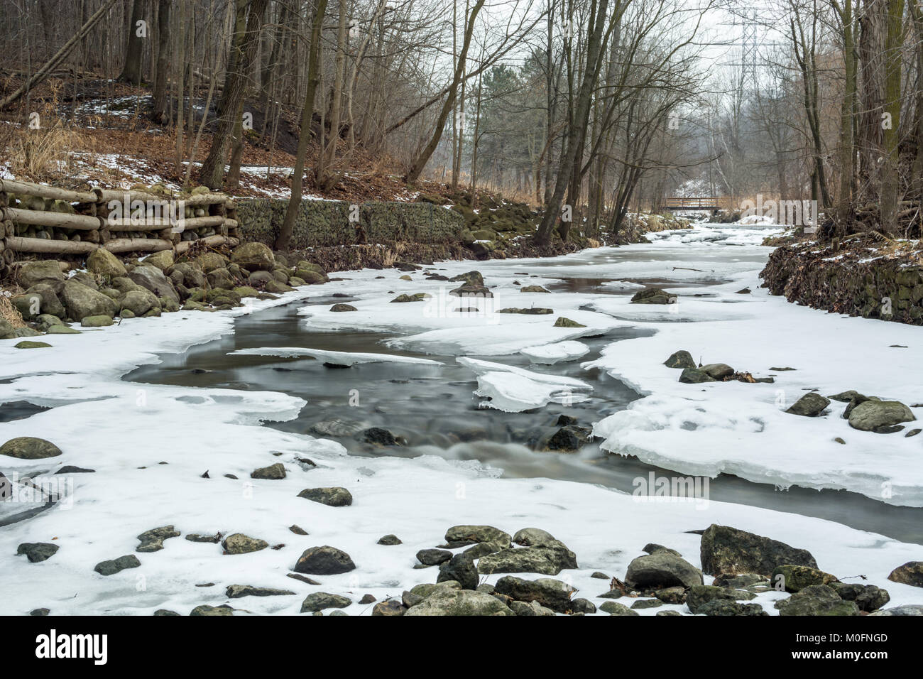Small Creek In Winter Ice And Snow Stock Photo - Alamy