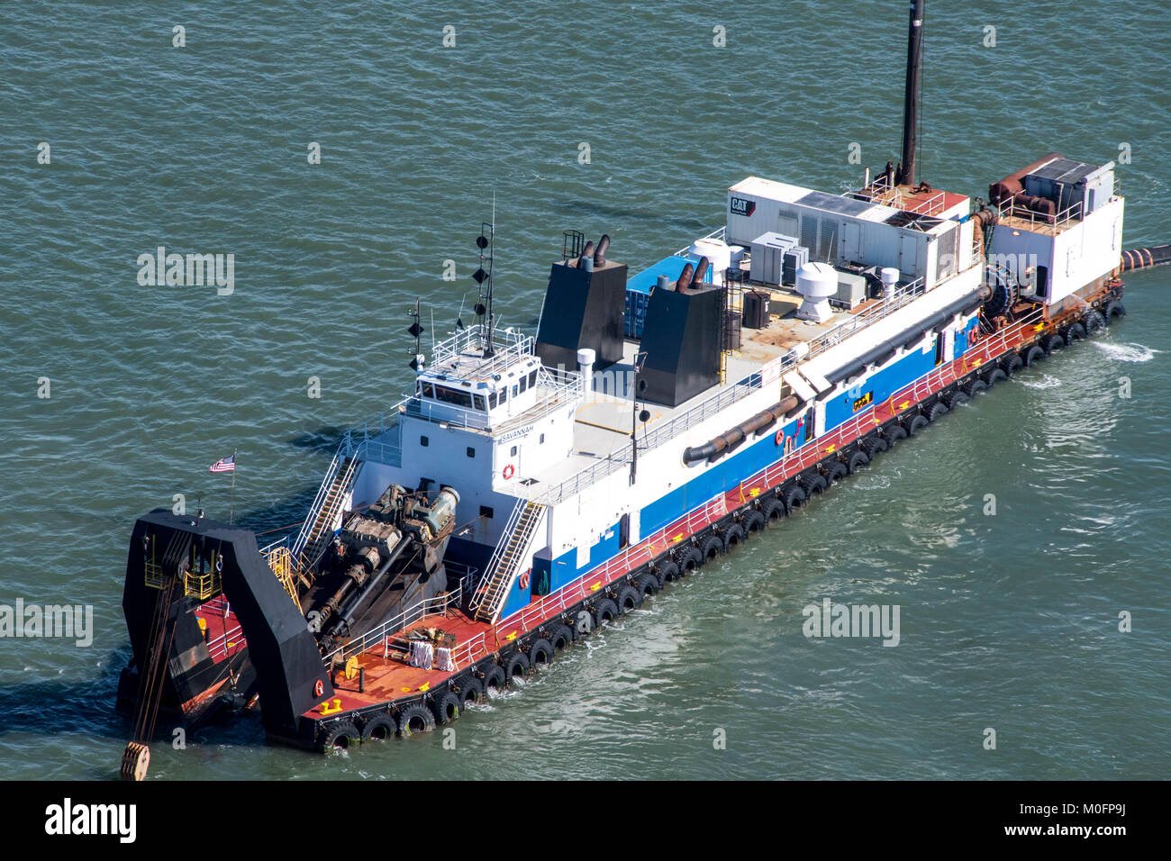Massive dredging ship siphons sand from ocean floor to restore beach ...