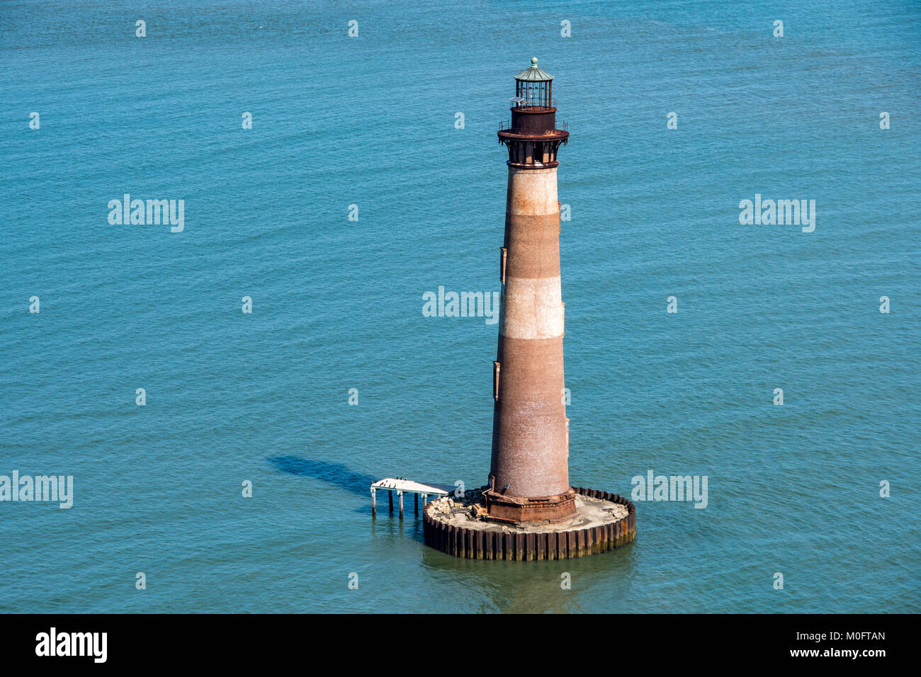 Lone lighthouse sits as a beacon of safety on South Carolina coastline ...