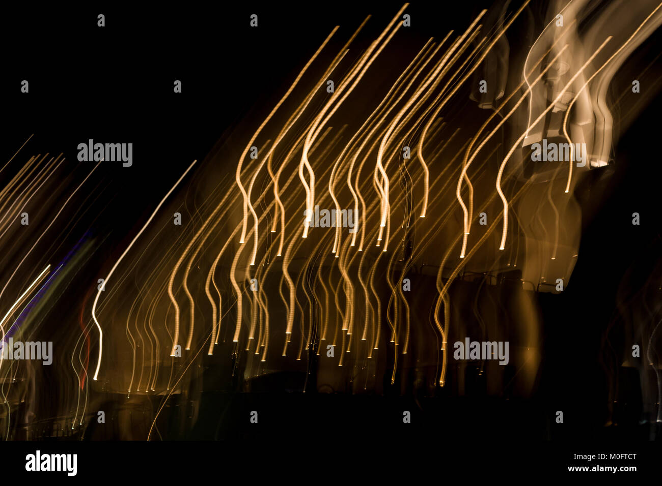 Abstract background with golden night lights defocused Stock Photo - Alamy