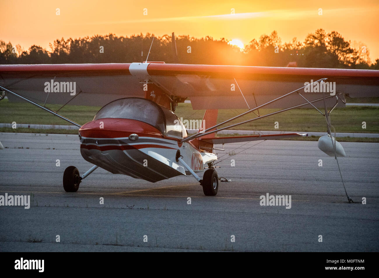 A Searey sport seaplane is bathed in warm dusk sunlight Stock Photo - Alamy