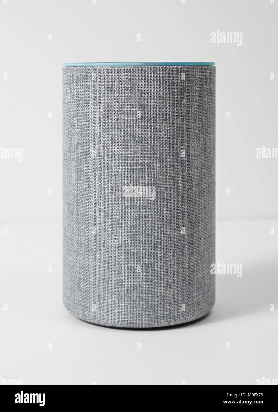 voice activated smart home speaker in white surroundings Stock Photo ...