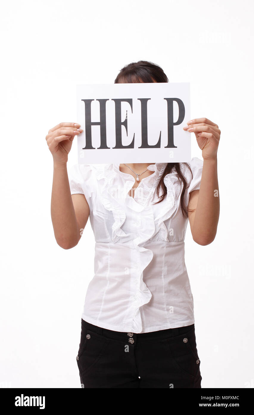 closeup. business woman showing poster with the word help Stock Photo ...