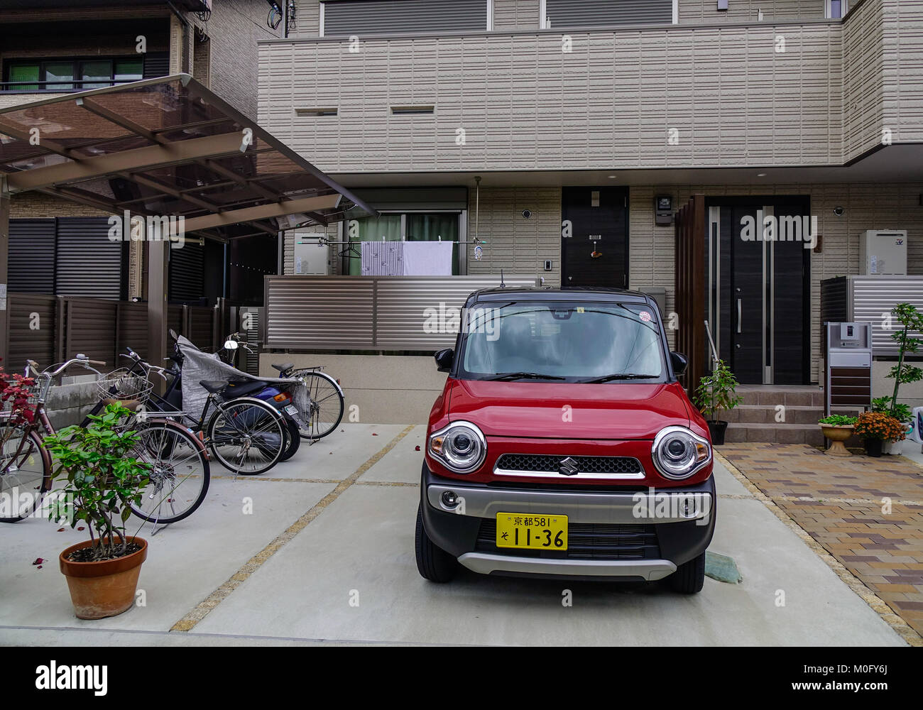 Kyoto, Japan - Nov 28, 2016. Japanese typical house with a small car at ...