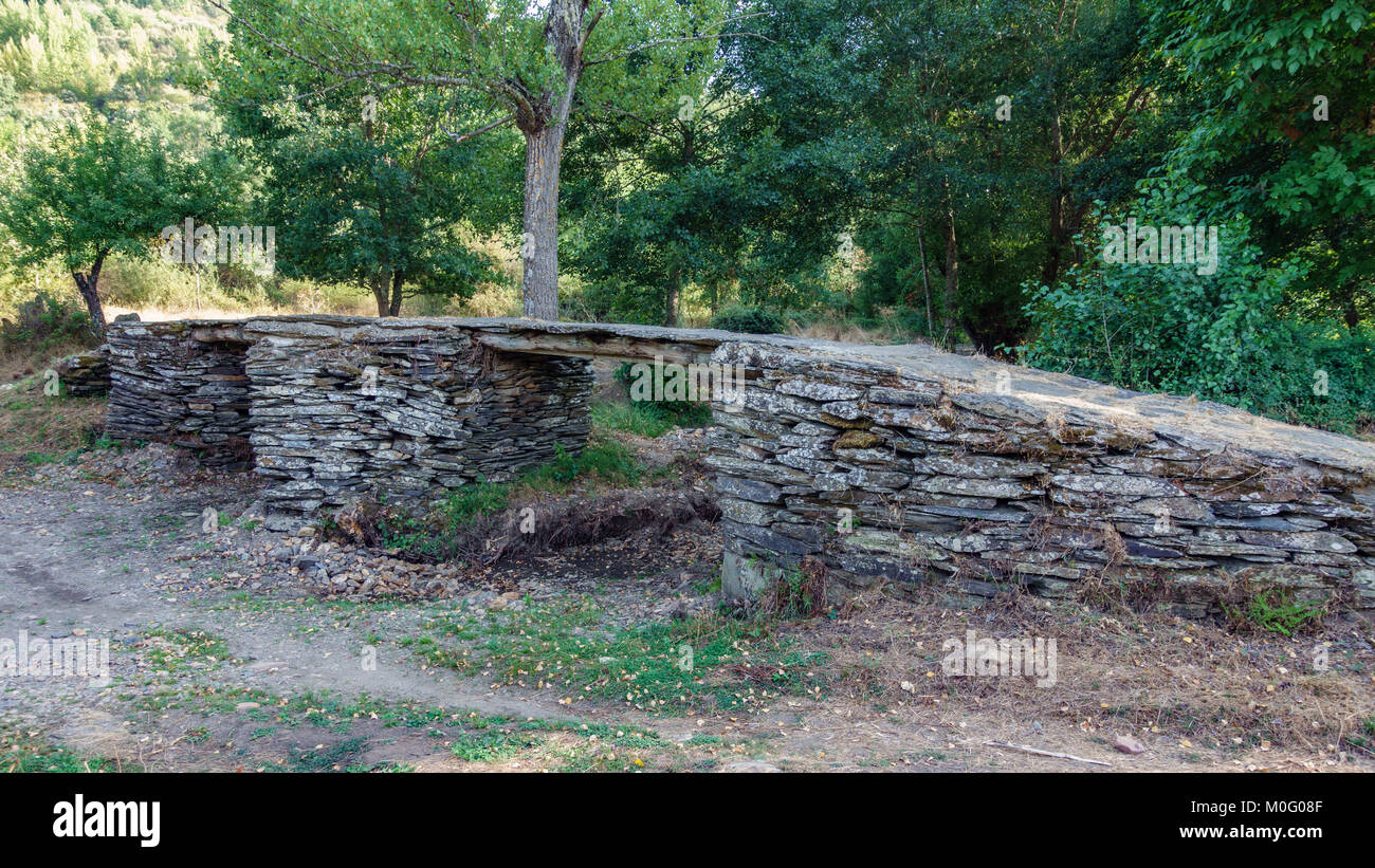 Slate and stone bridge over dry river Stock Photo - Alamy