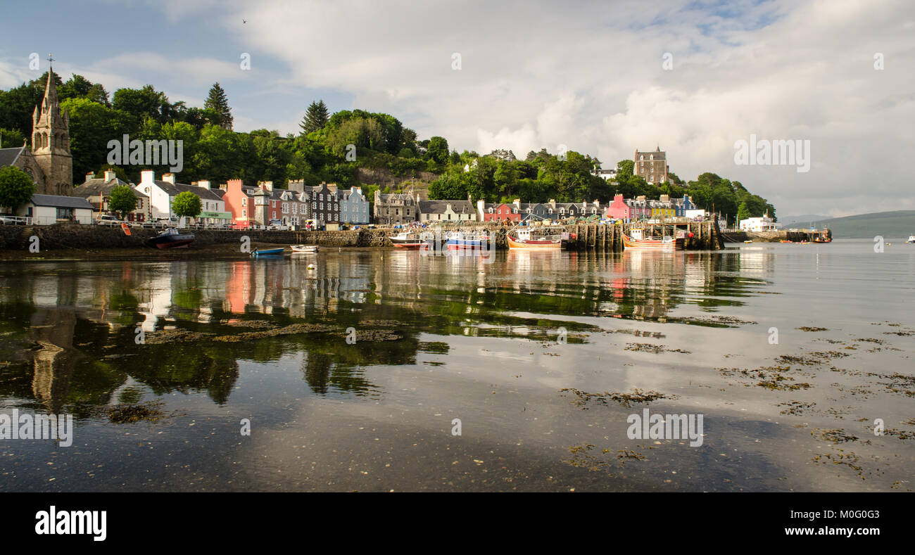 The famous quaint waterfront of colourful traditional houses and church ...