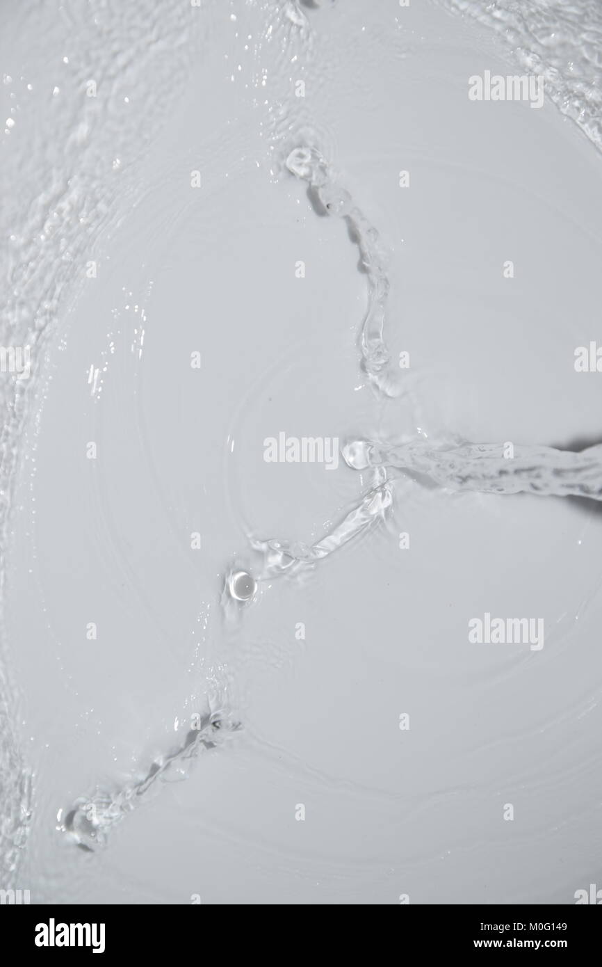 clear water on white surface for background Stock Photo - Alamy