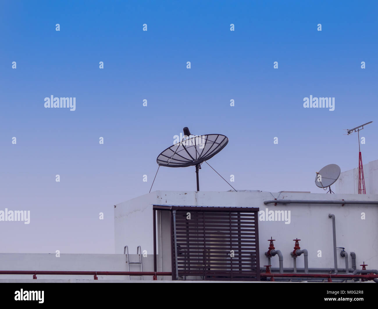 Satellite dish on the roof Stock Photo - Alamy
