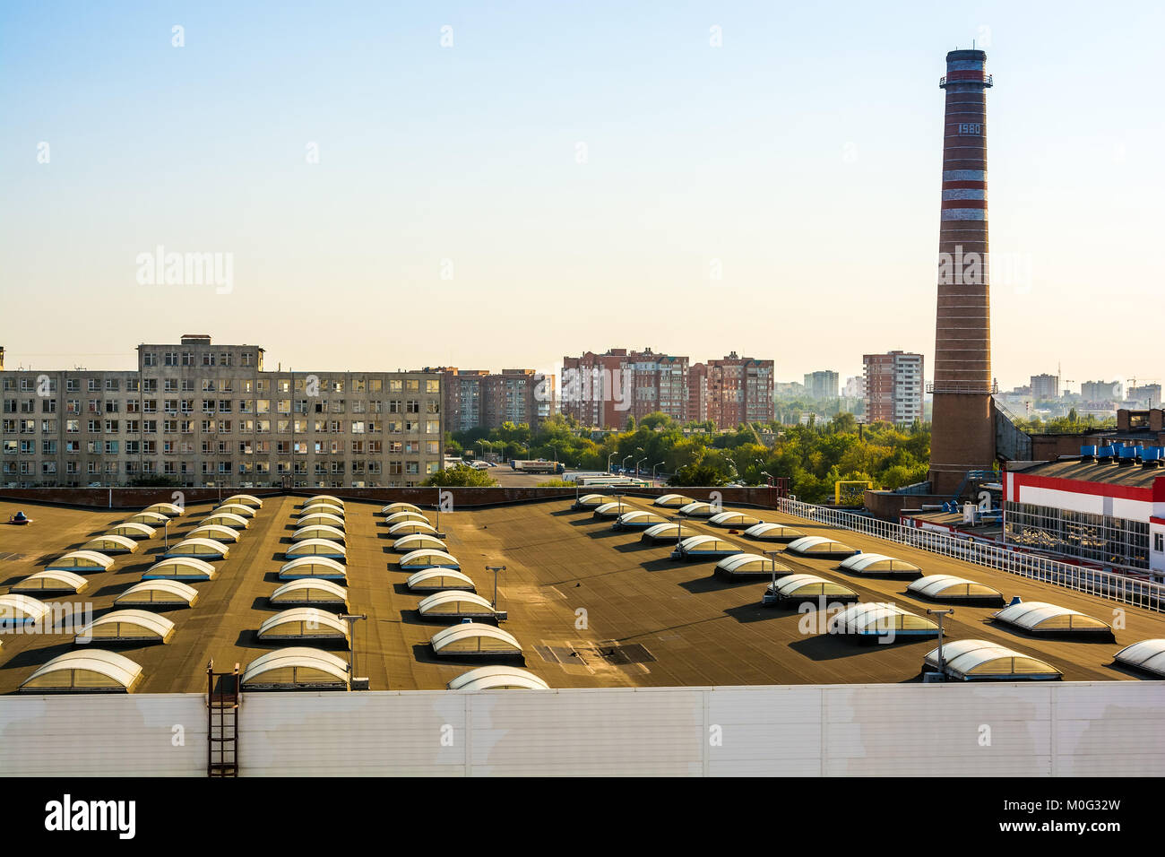 Rooftops of industrial buildings in a big city Stock Photo - Alamy