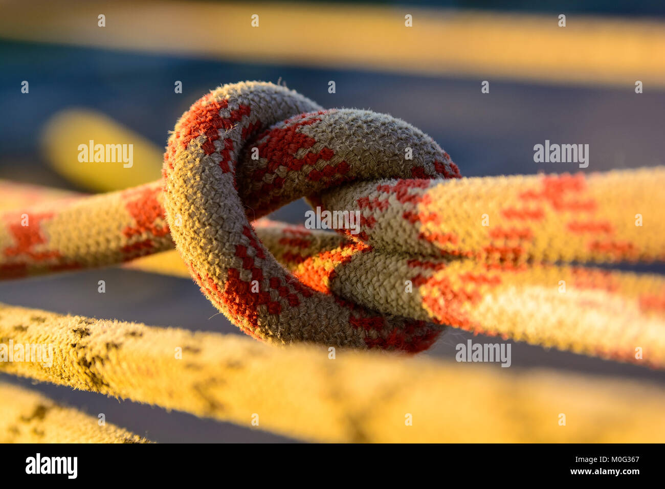 Close up image of rope stretched and tied on rooftops for climbing ...