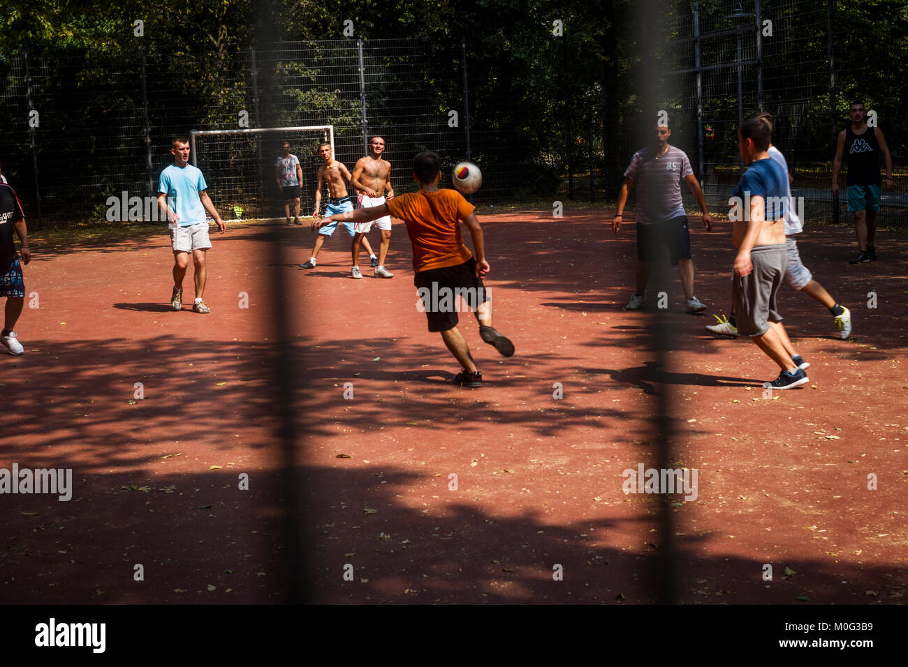 Park football summer men hi-res stock photography and images - Alamy