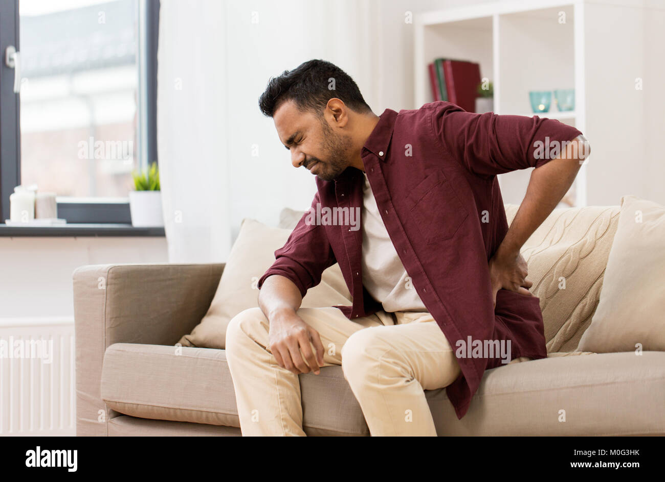Indian man backache pain illness hi-res stock photography and images ...