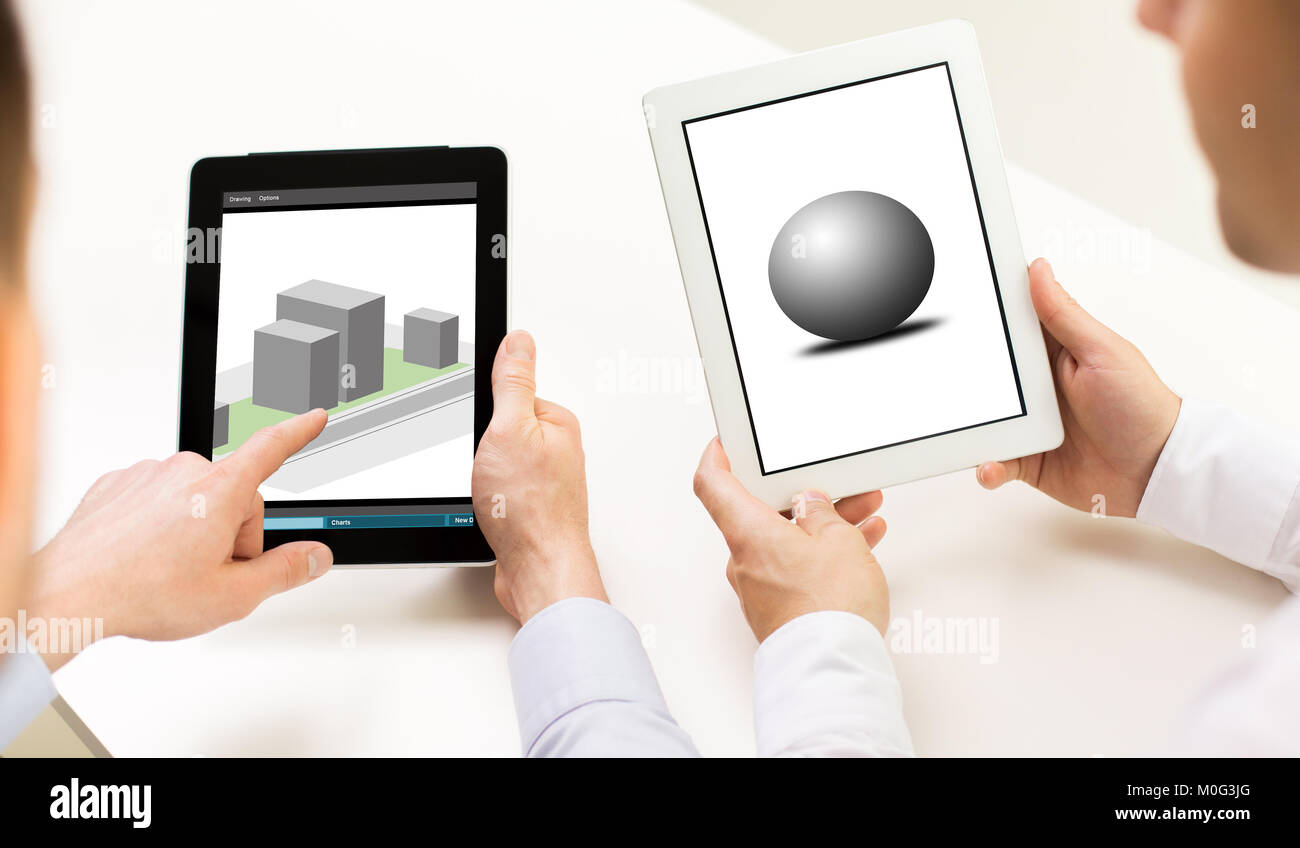 designers with 3d models on tablet pc screens Stock Photo - Alamy