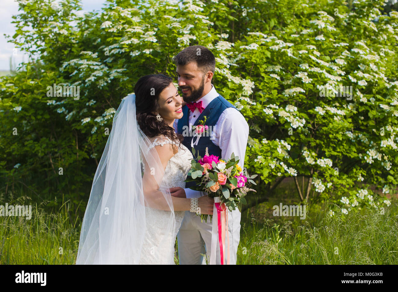 Beautiful stylish bride and groom became husband and wife posing in ...
