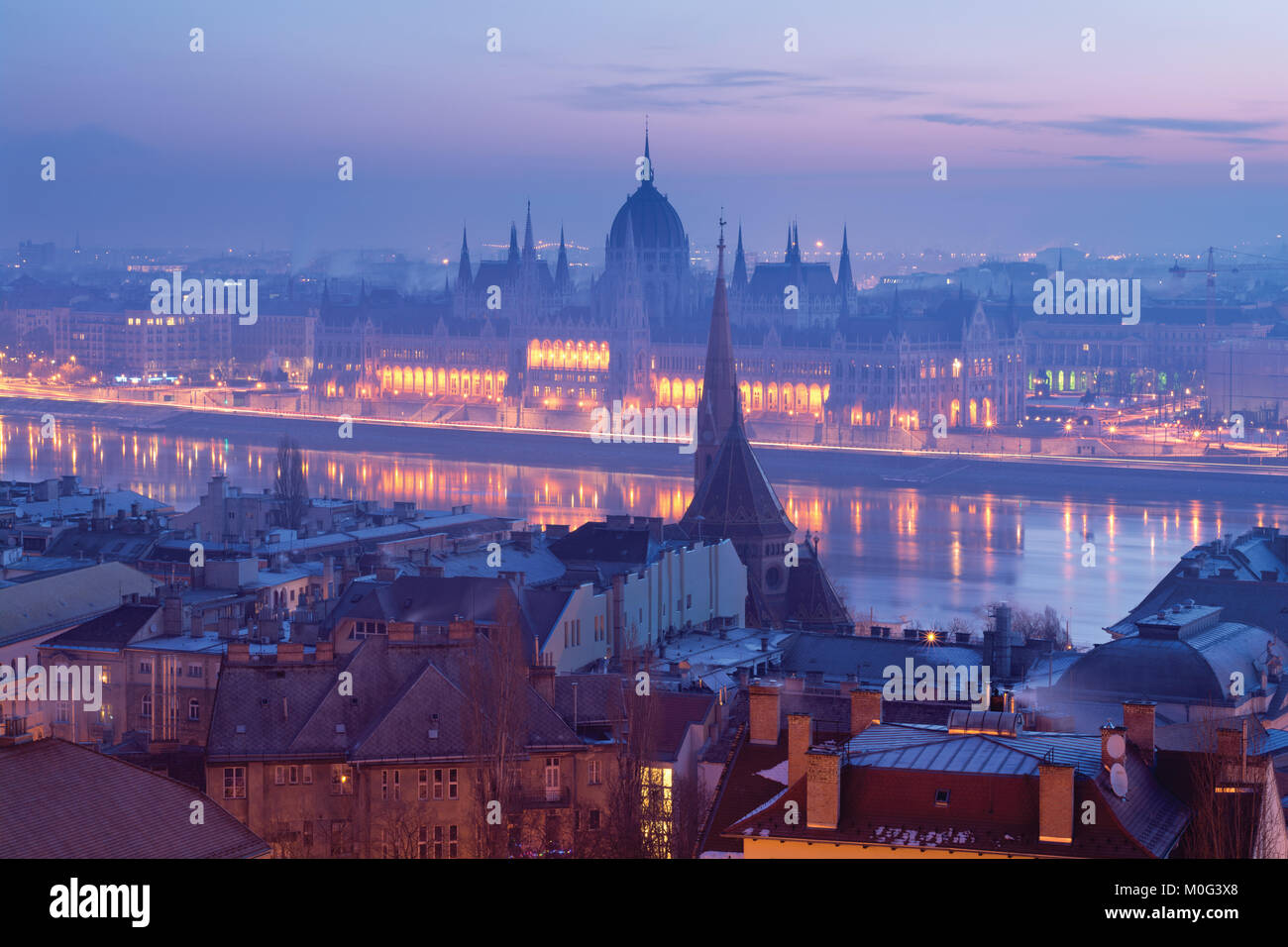 Budapest Parliament building view in morning blue haze across the river ...