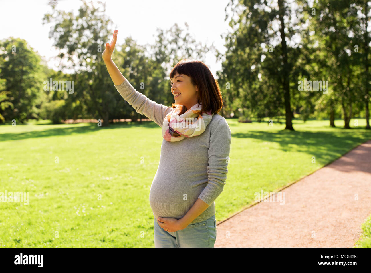 Pregnant belly hi hi-res stock photography and images - Alamy